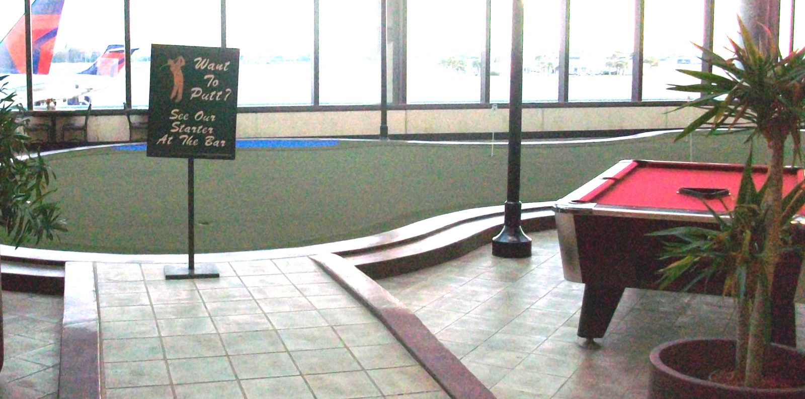 Play golf or a game of pool at Palm Beach Airport - Stuck at the Airport